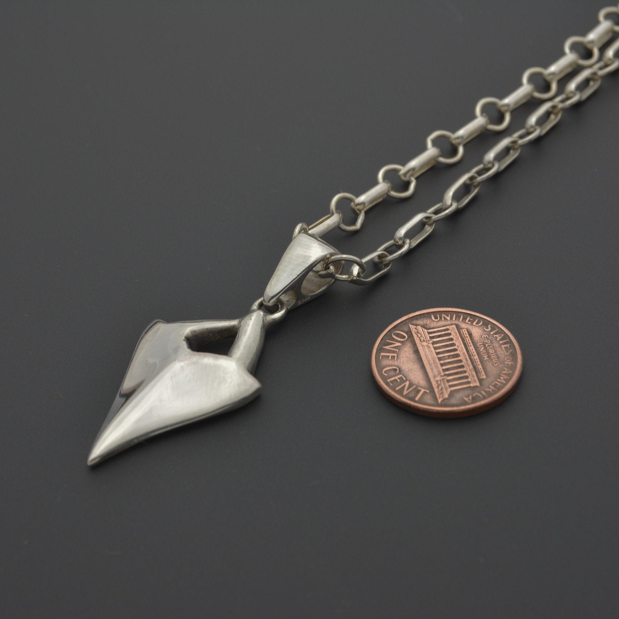 Make a Bold Statement with an Arrowhead Silver Pendant and Heavy Oval ...